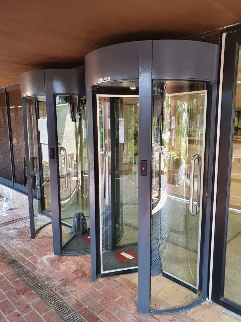 Glass Access Controlled Turnstiles for bank HQ - Turnstar